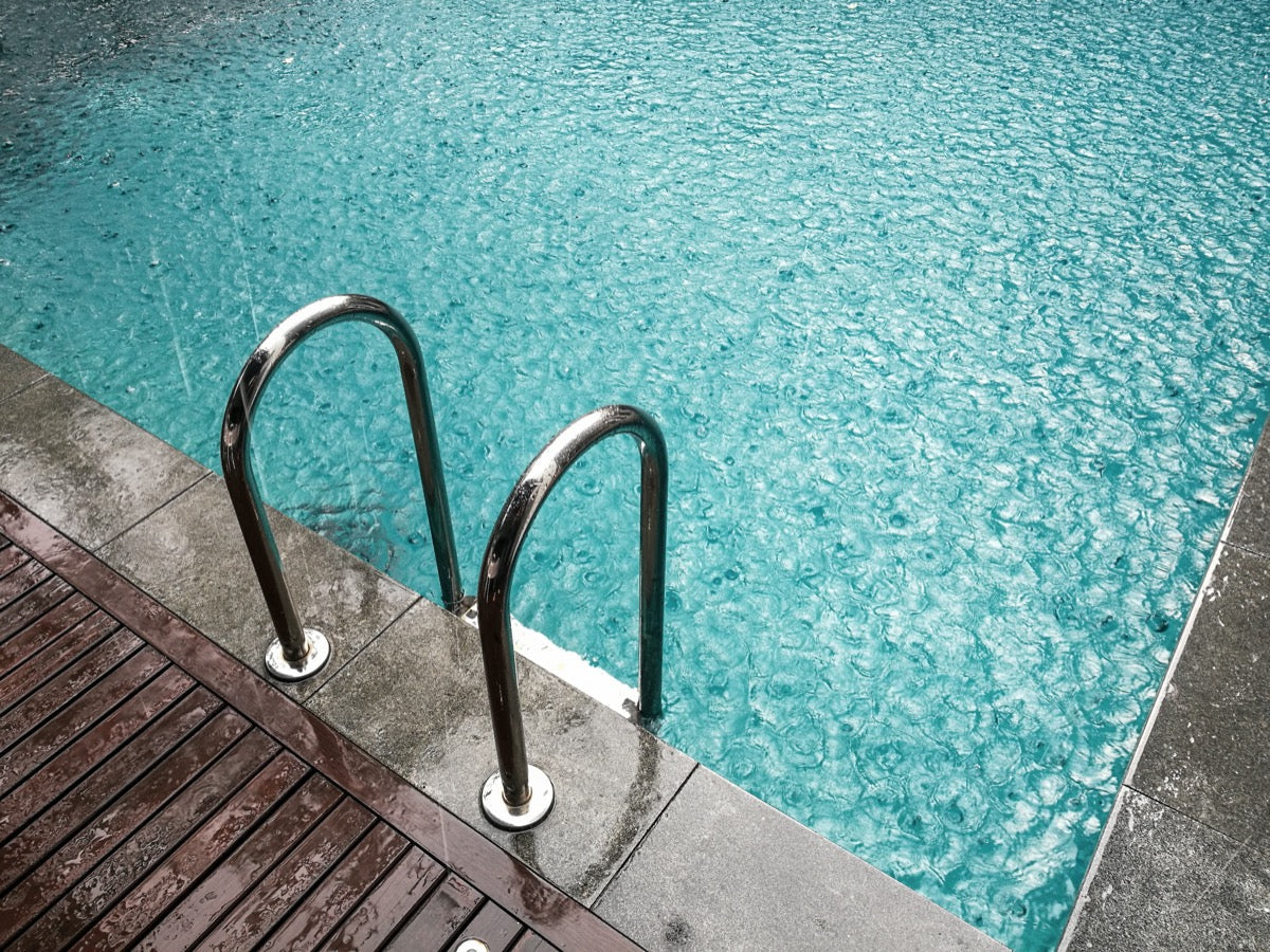 Cleaning Your Swimming Pool After Heavy Rains, Storms, and Strong Wind ...